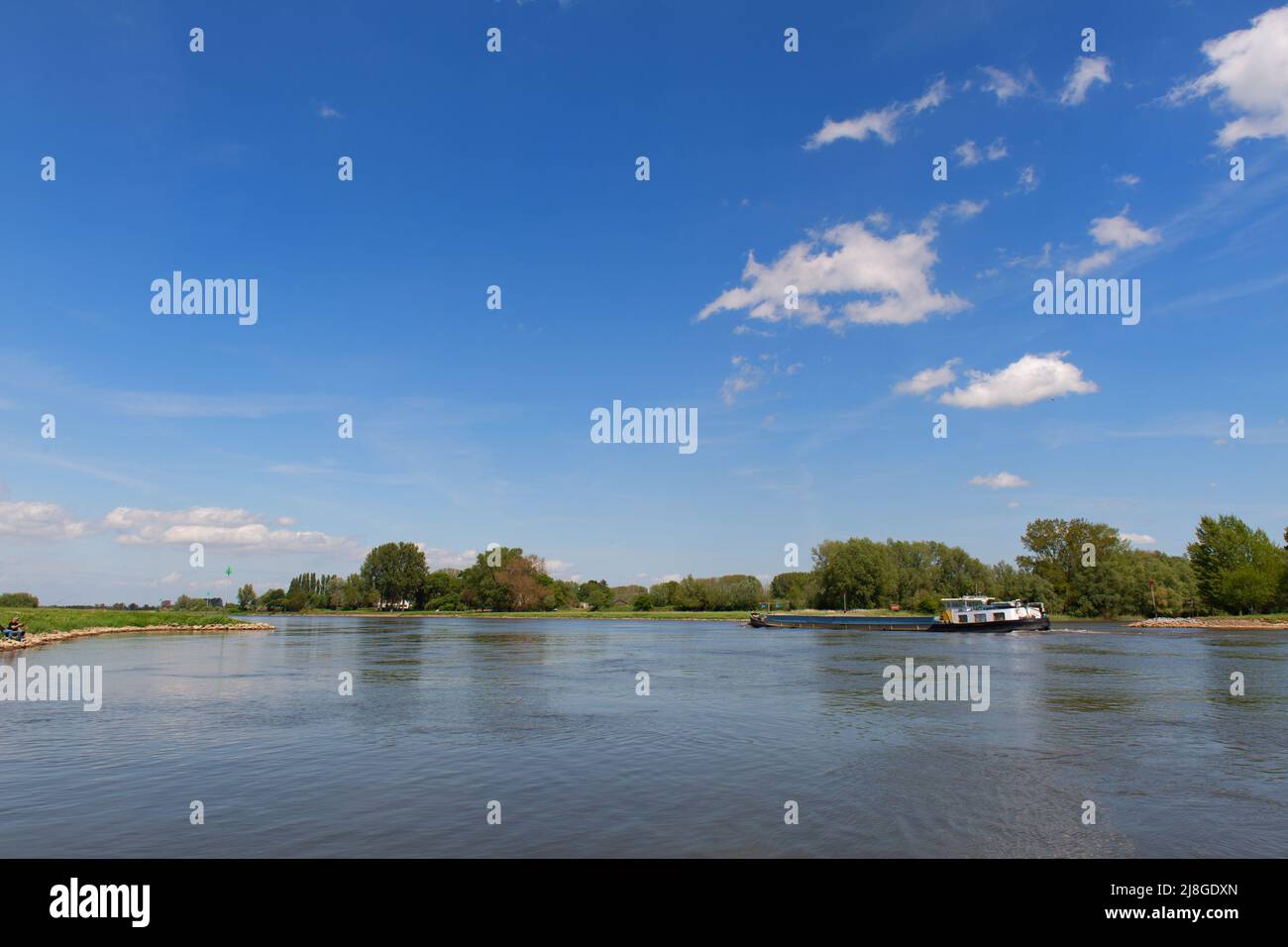 Landscape Dutch river the IJssel with boat Stock Photo - Alamy