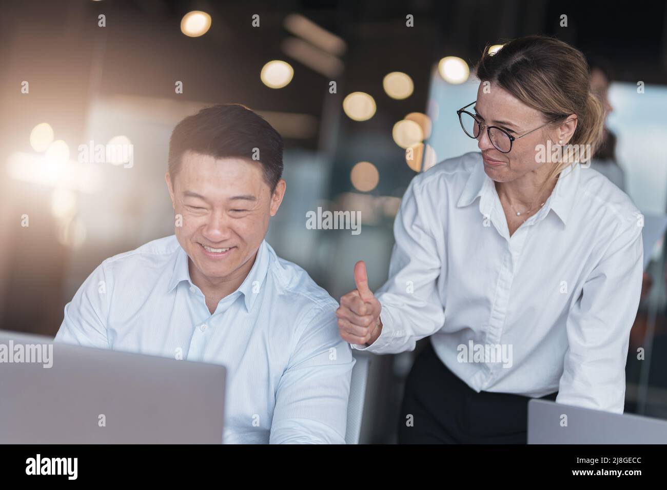 Picture of excited happy emotional colleagues in office working with ...