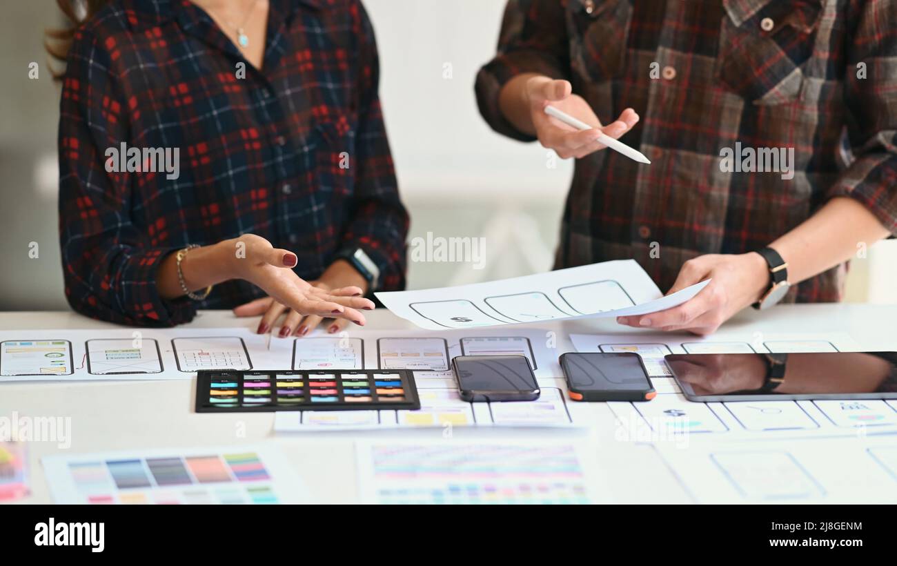 Cropped shot creative people planning application and developing ... Cropped shot creative people planning application and developing ...