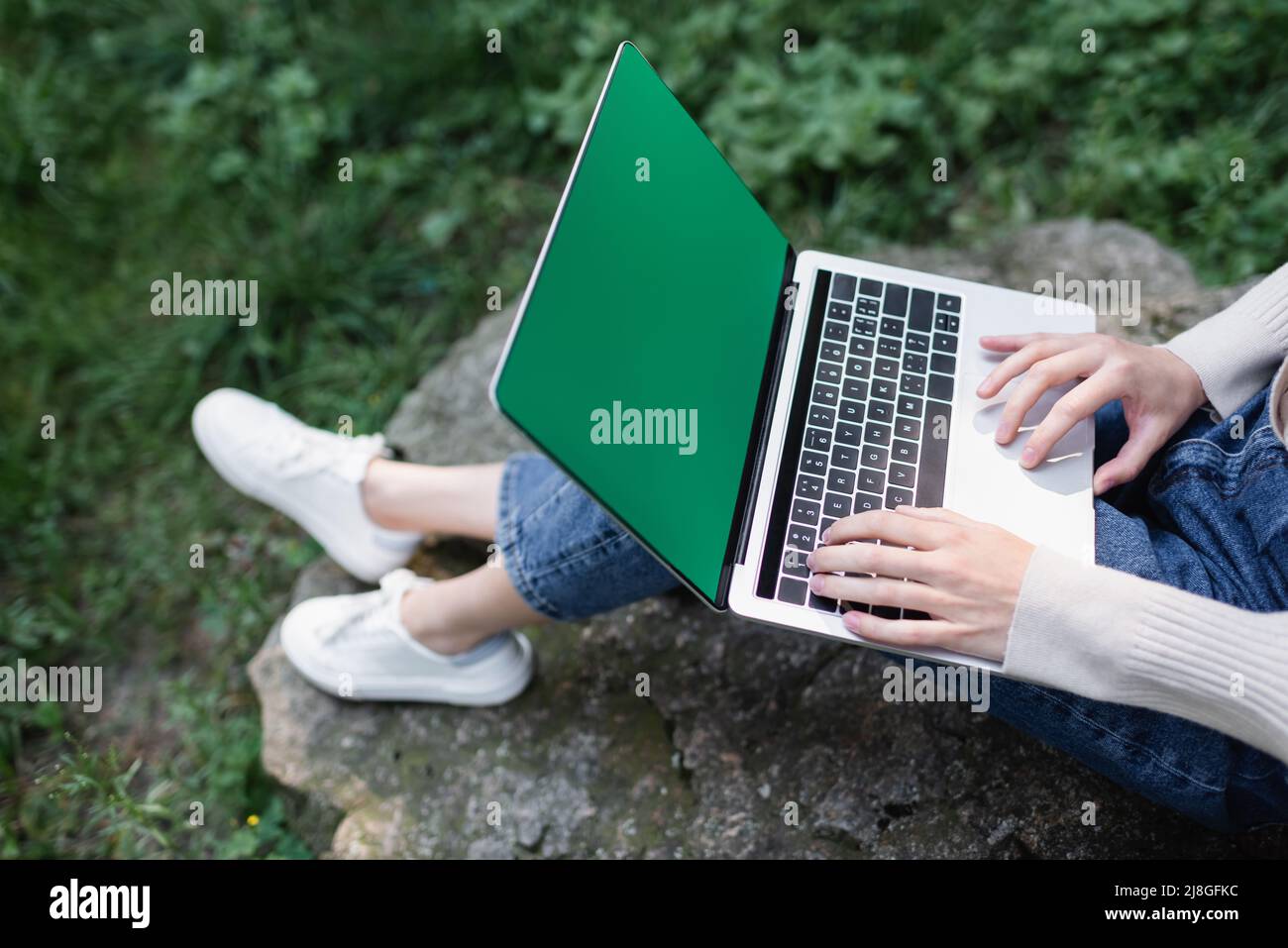Woman using green screen laptop hi-res stock photography and images - Alamy