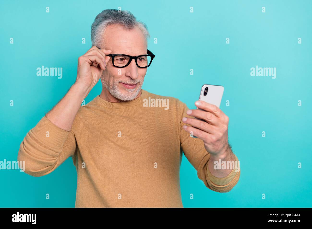 Photo of positive person hand touch eyeglasses look telephone isolated ...