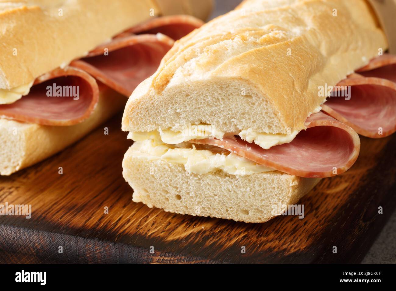 Tasty jambon-beurre is a French ham sandwich made of a fresh baguette ...