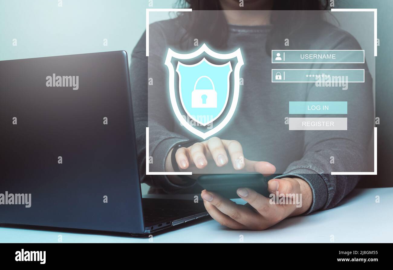 Young woman logging in personal user information from smartphone ...