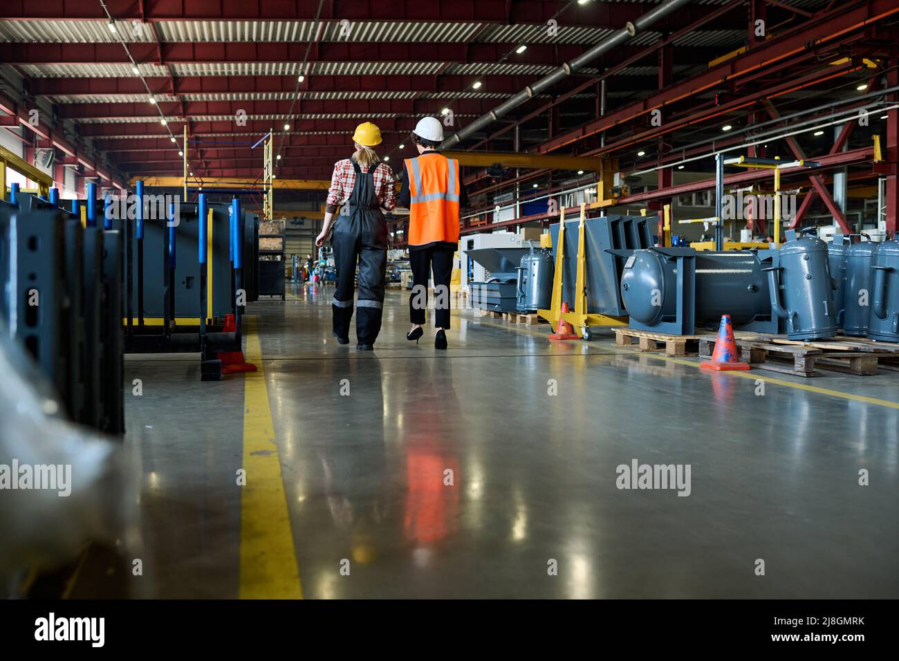 Two engineers in modern warehouse hi-res stock photography and images ...