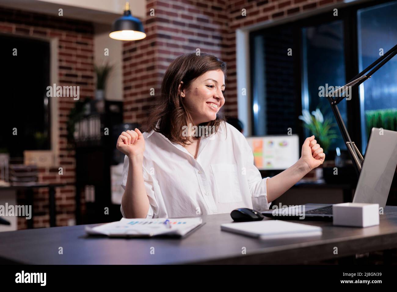 Happy employees positive manager celebrating hi-res stock photography ...