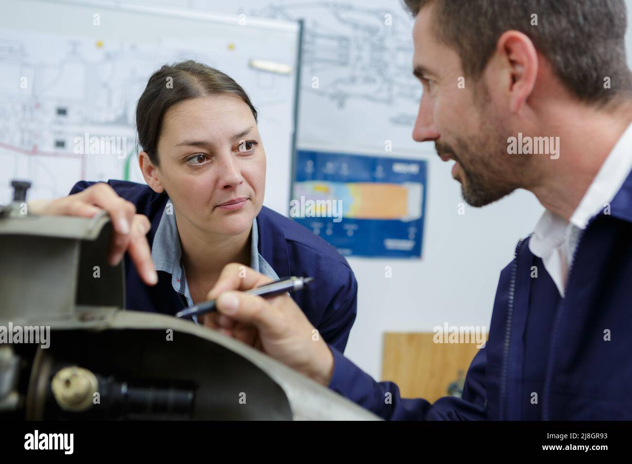 Woman operating a machine hi-res stock photography and images - Alamy