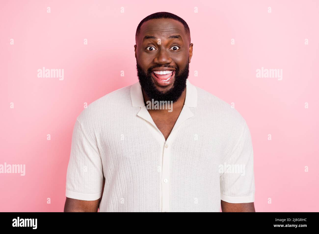 Photo of handsome excited young man wear white shirt smiling open mouth ...