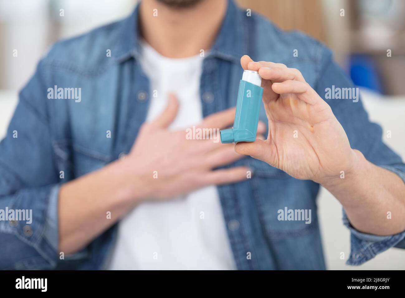 asthma inhaler in a male hands Stock Photo - Alamy