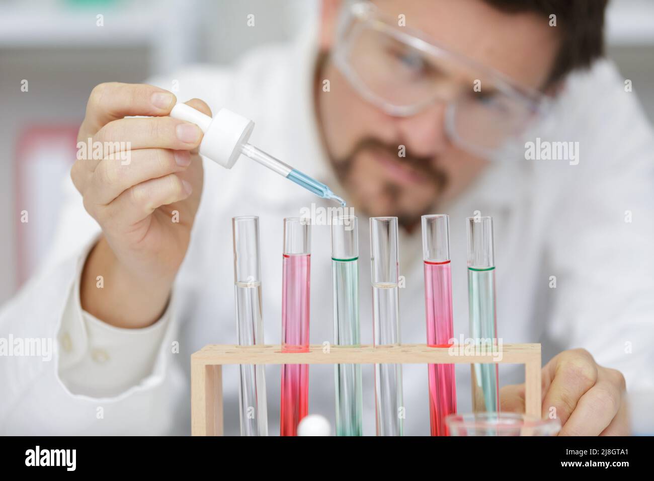 man during a microbiological laboratory test Stock Photo - Alamy