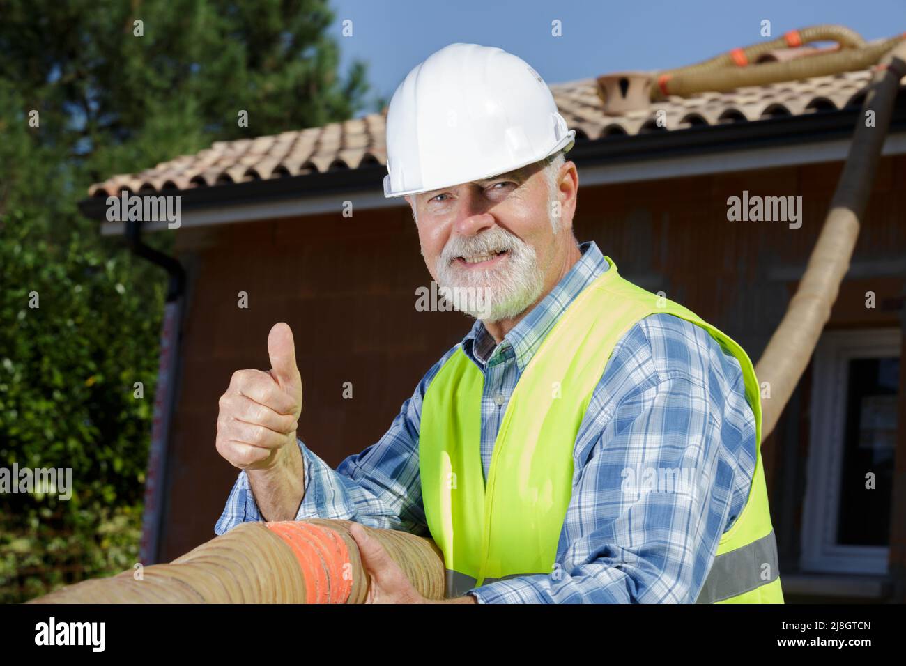 senior engineer man showing thumbs up Stock Photo - Alamy