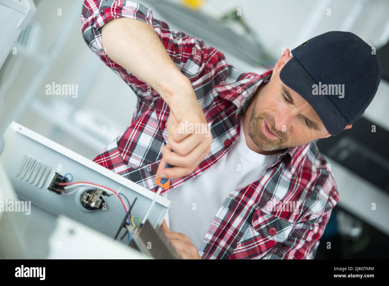 Electronic equipment assembler hi-res stock photography and images - Alamy