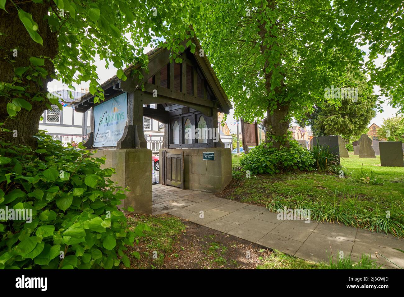 Old style covered entrance to a church Stock Photo - Alamy
