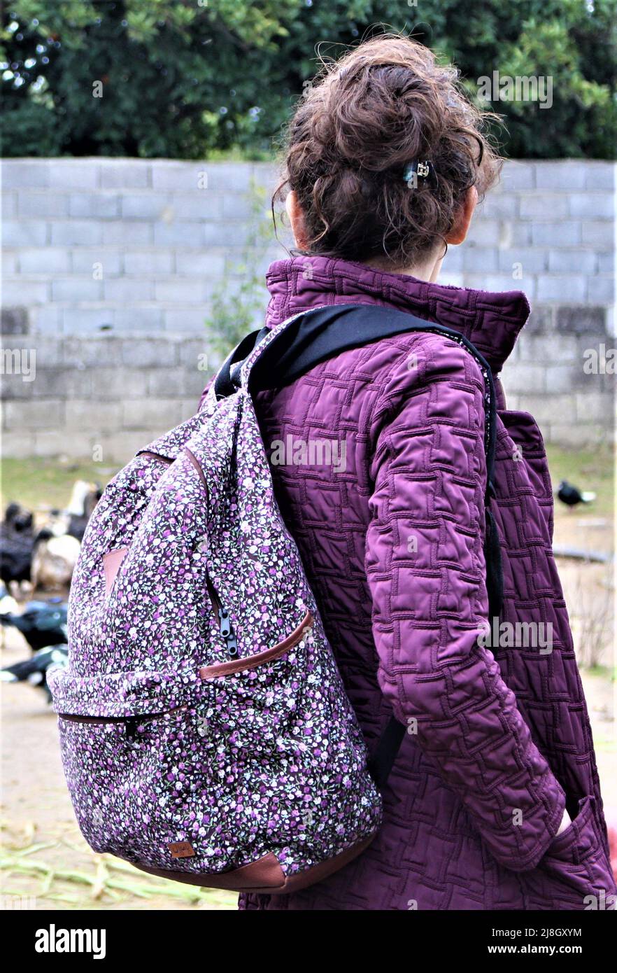 Curly girl in pink hi-res stock photography and images - Alamy