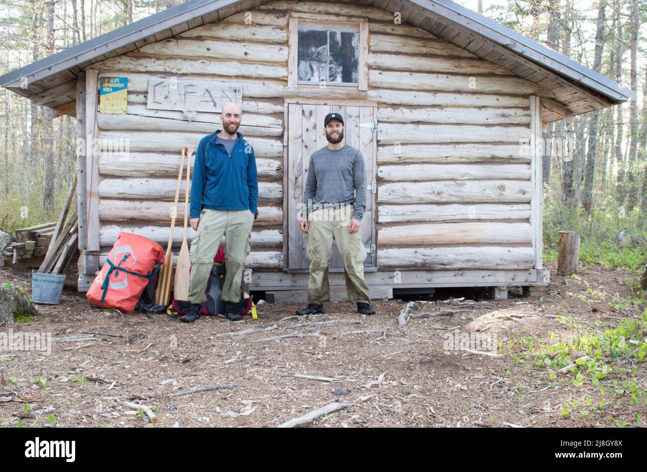 Canoeists in front of Cofan Cabin Stock Photo - Alamy