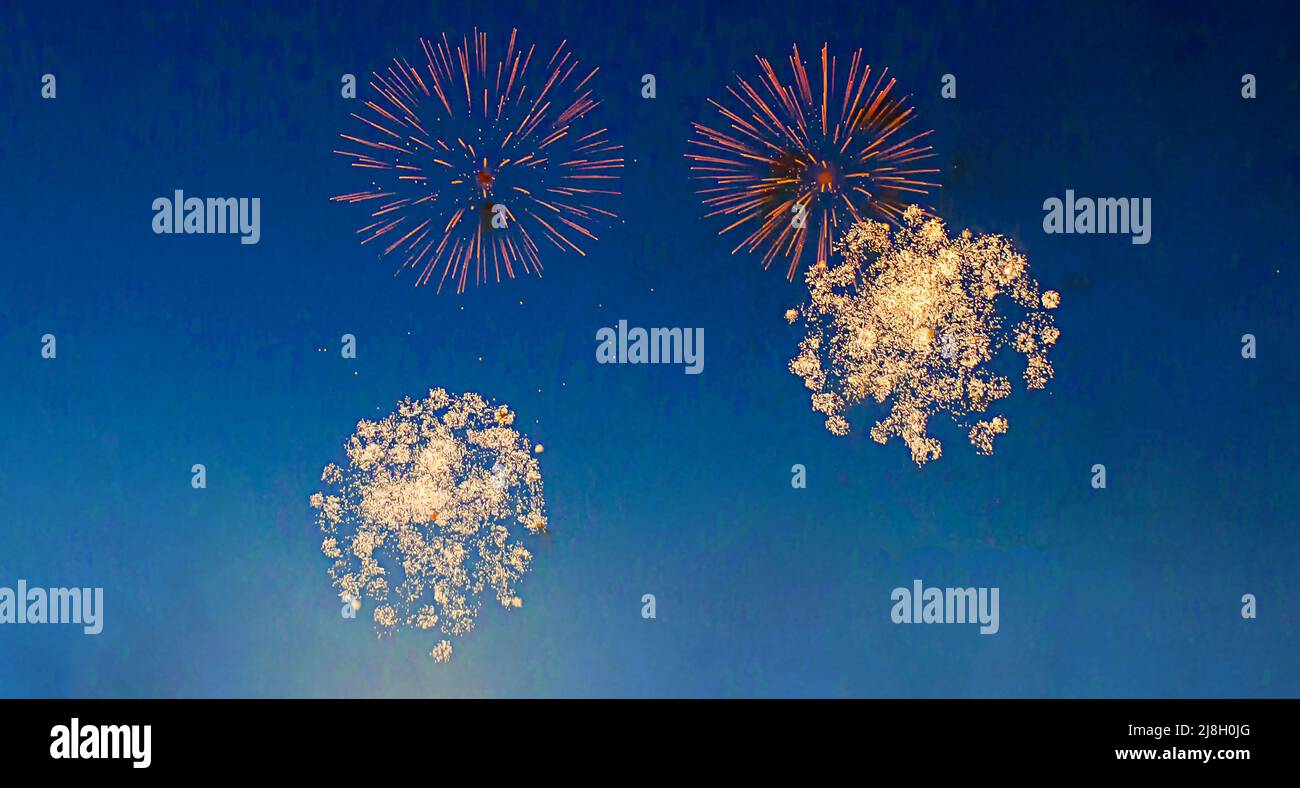 four beautiful fireworks in night sky.Fireworks background Stock Photo ...