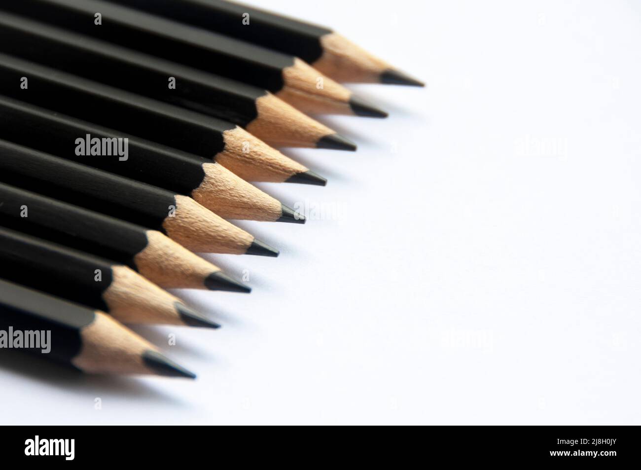 Wooden pencil on white background. Copy space Stock Photo - Alamy