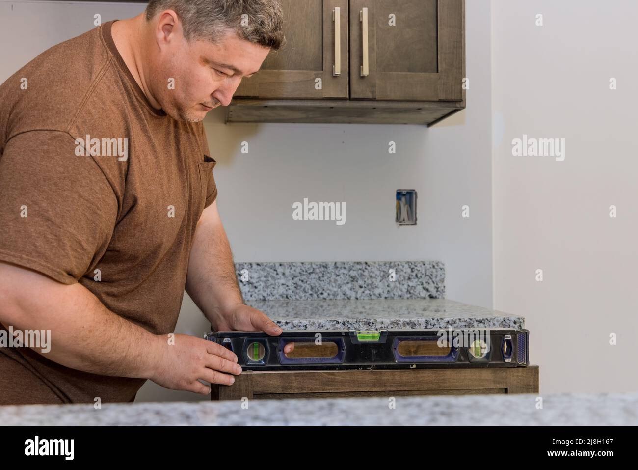 Leveling countertop hi-res stock photography and images - Alamy