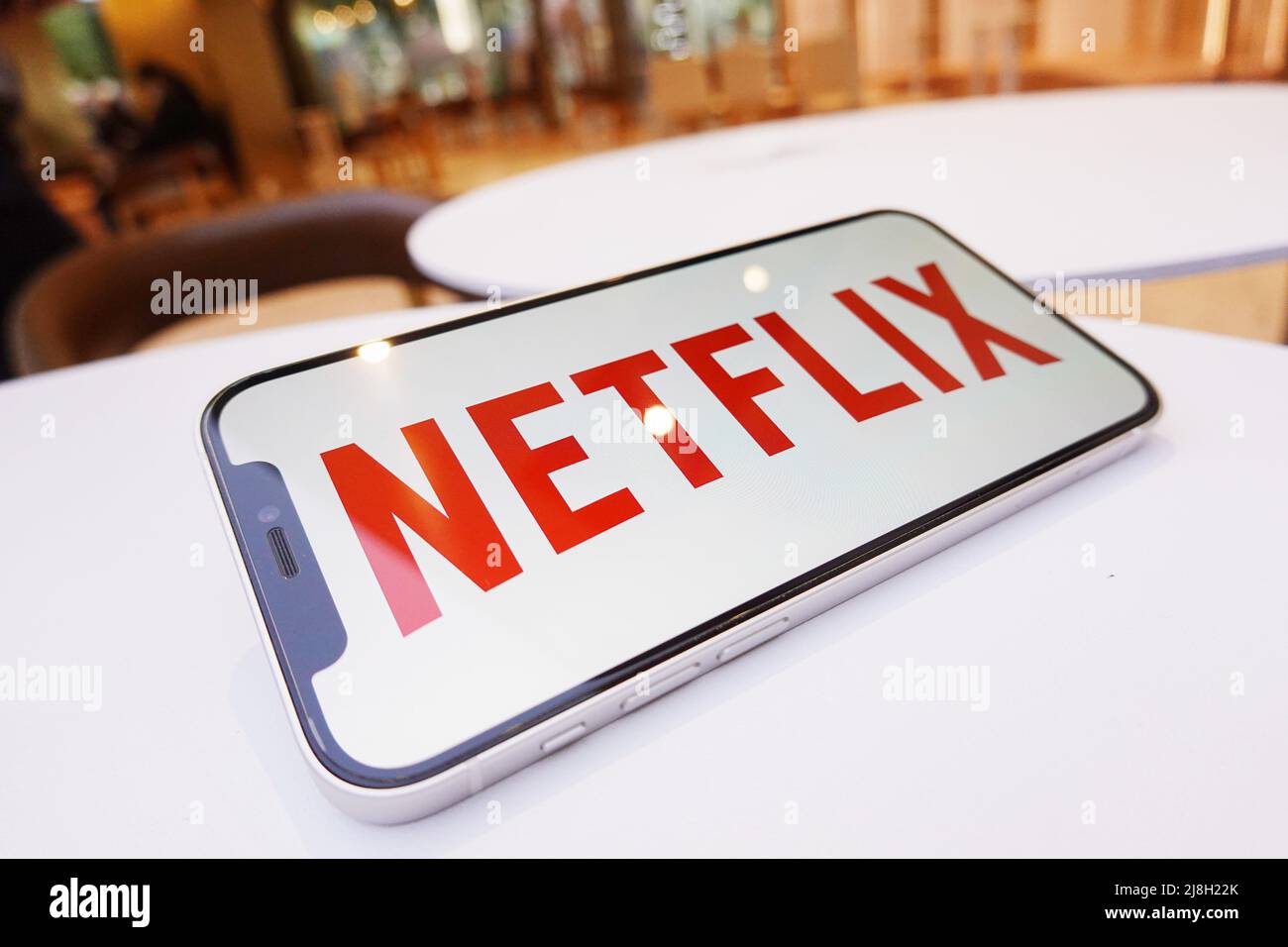 In this photo illustration, a Netflix logo is displayed on the screen ...