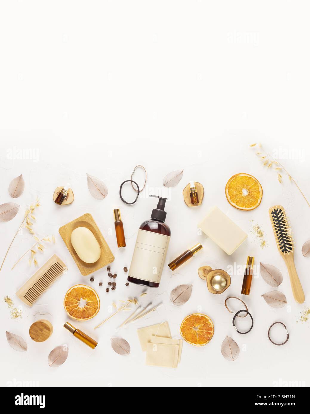 Hair care card with shampoo bottle, organic soaps, oils, lemon and ...