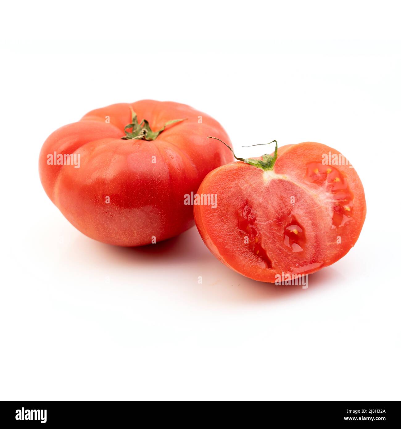 Fresh tomato isolated on white background Stock Photo - Alamy
