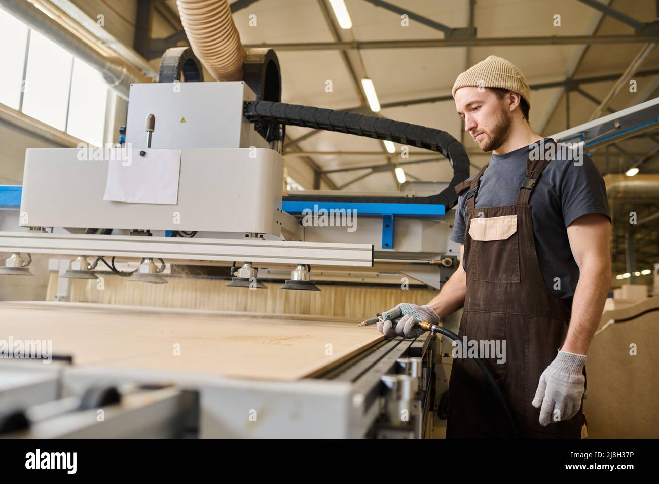 Wood furniture factory machine hi-res stock photography and images - Alamy