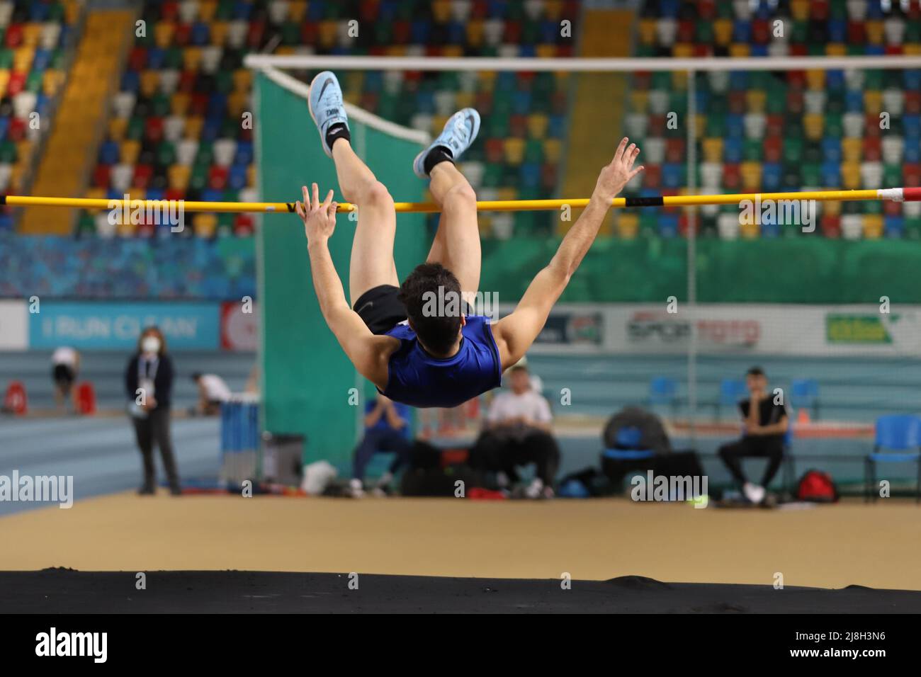 ISTANBUL, TURKEY - DECEMBER 25, 2021: Undefined athlete high jumping ...