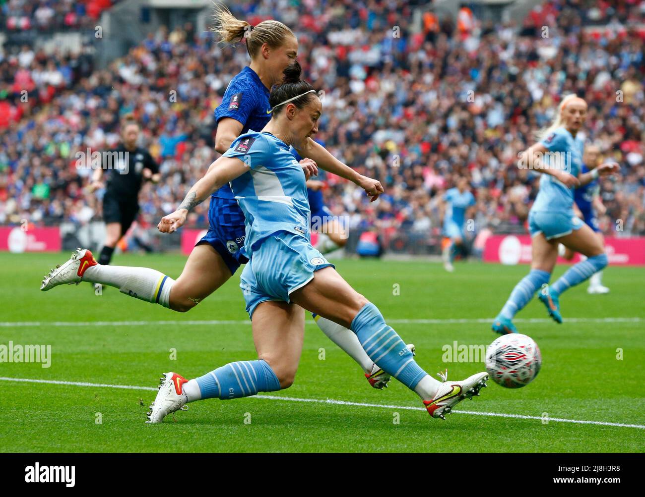 LONDON, ENGLAND - MAY 15:L-R Lucy Bronze of Manchester City WFC takes ...