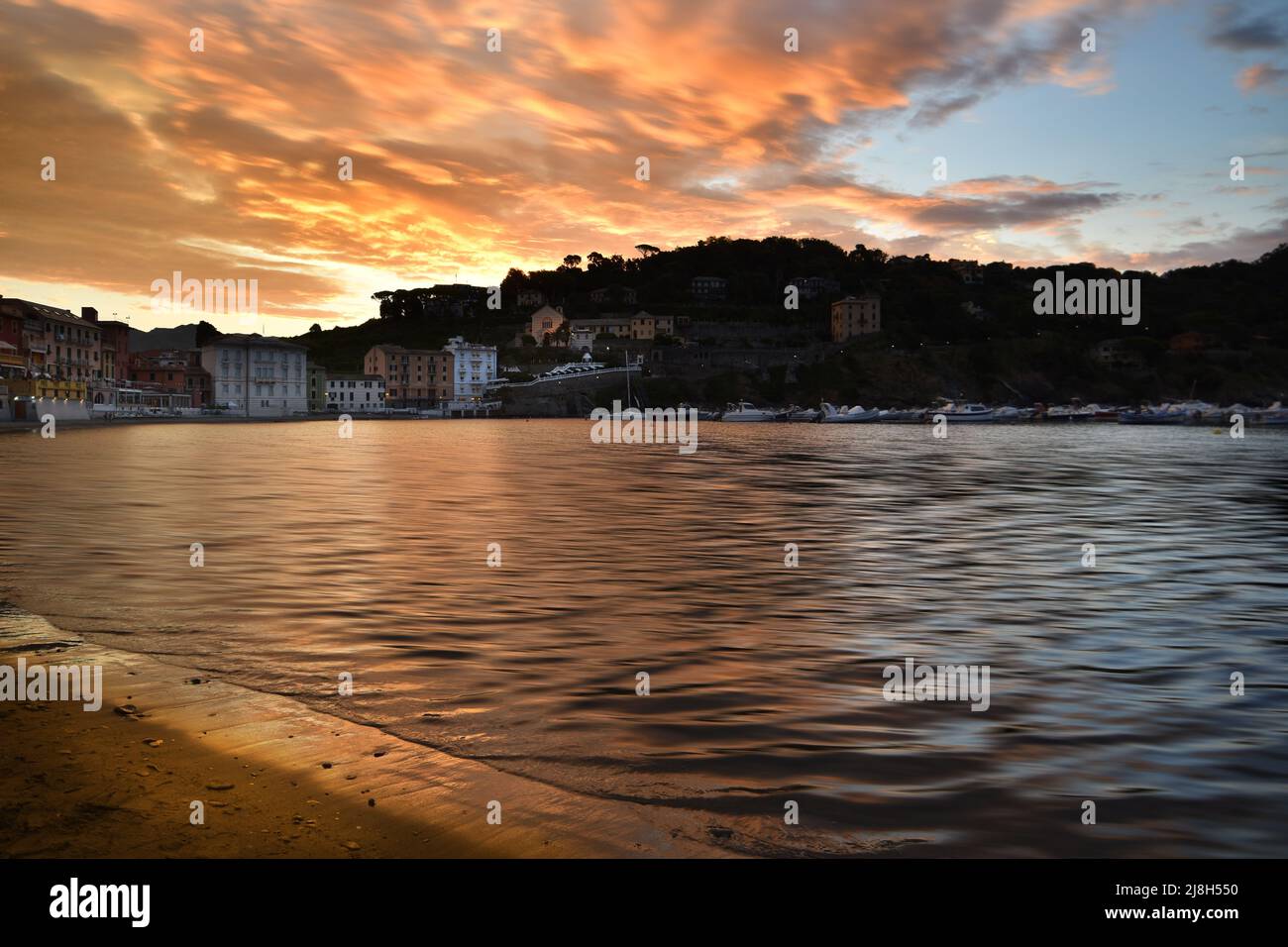 View of a wonderful sunrise, with colors and lights that give a magical ...