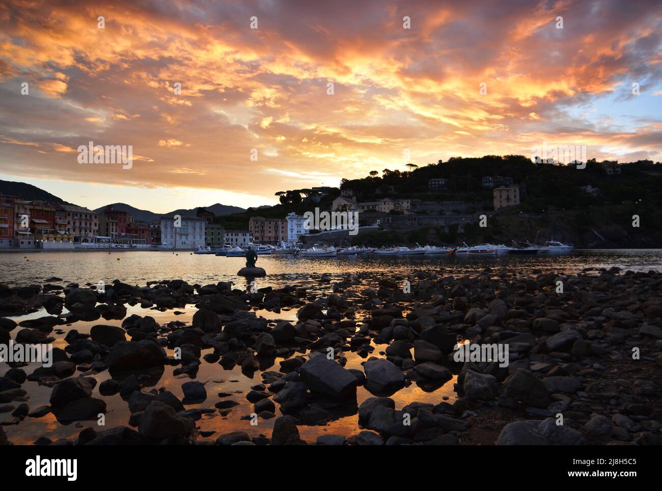 View of a wonderful sunrise, with colors and lights that give a magical ...