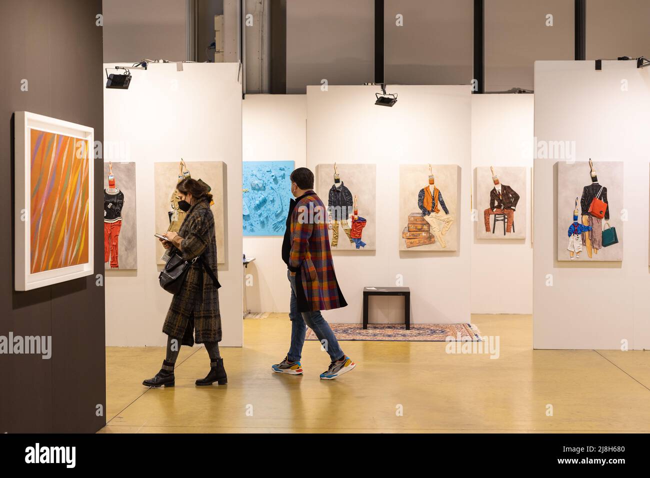 People Walking and Admiring Paintings in a Modern Art Gallery Stock ...