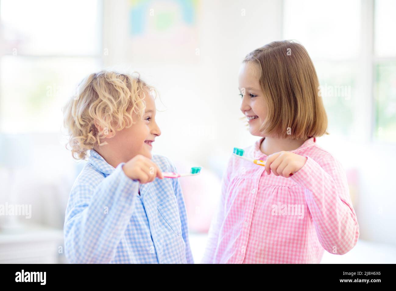 Child brushing teeth. Kids with toothpaste and brush. Dental and oral ...