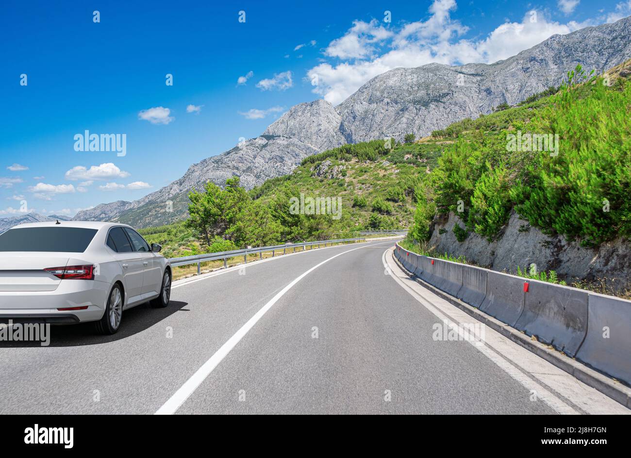 Car drives along asphalt road hi-res stock photography and images - Alamy