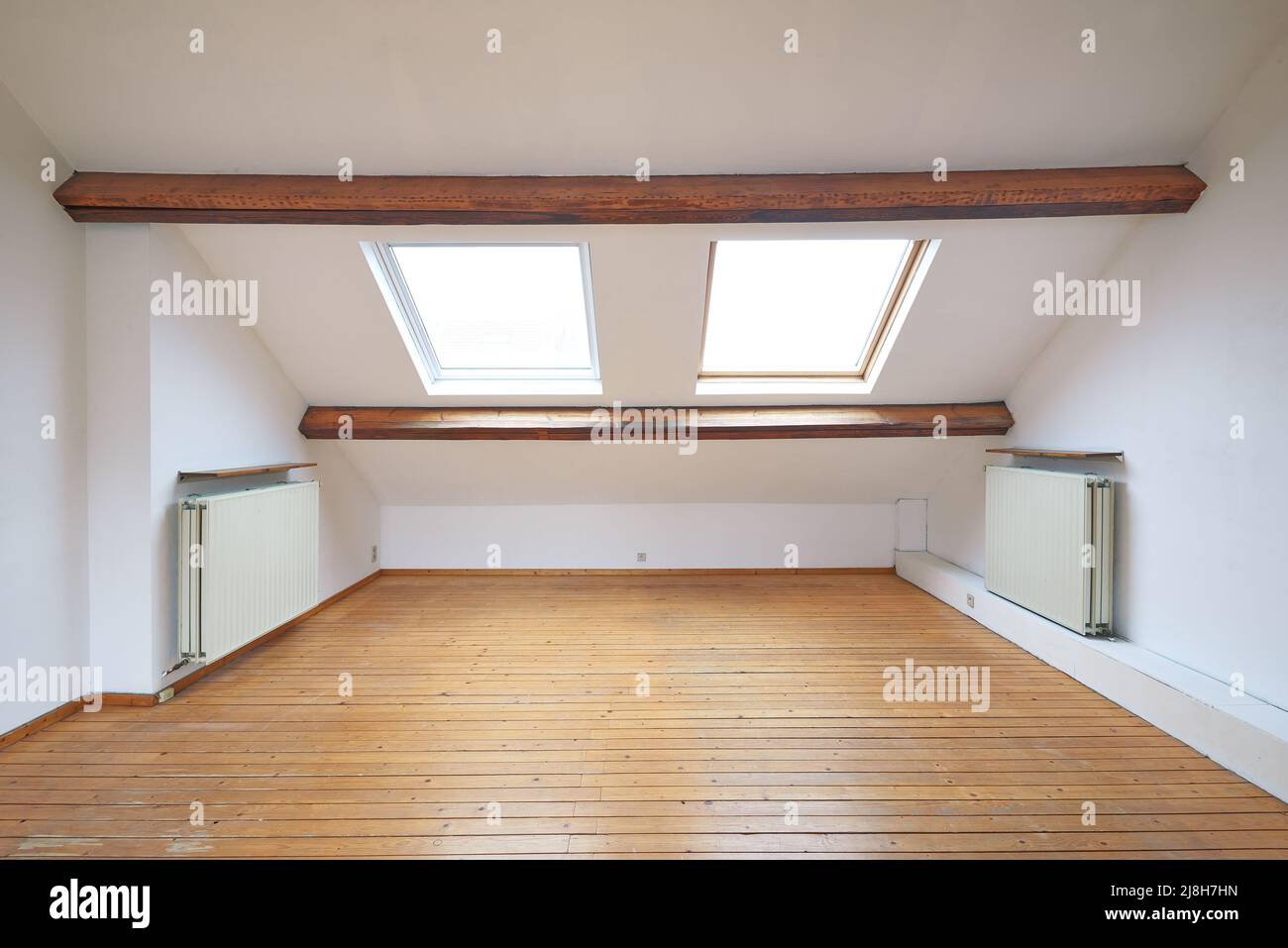 Interior attic windows and hardwood floor in empty room Stock Photo - Alamy