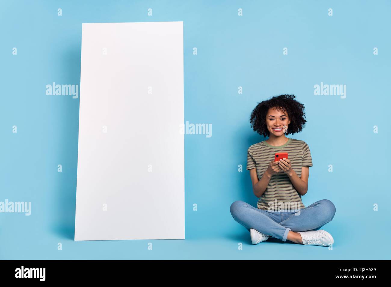 Full body photo of lady sit white poster use gadget search website sale ...