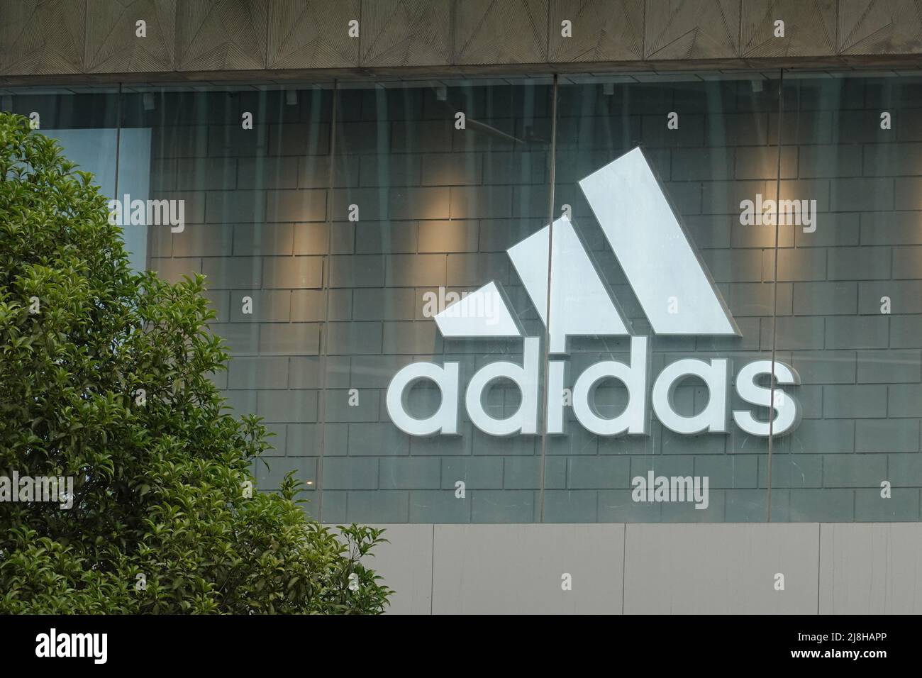 An Adidas clothing store logo in Changzhou. (Photo by Sheldon Cooper ...