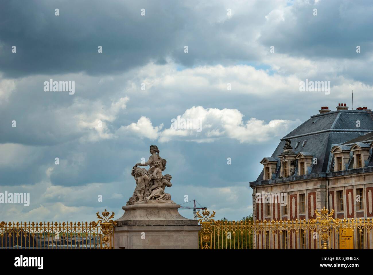 Statue on a pillar of the fence of Versailles Palace Stock Photo - Alamy