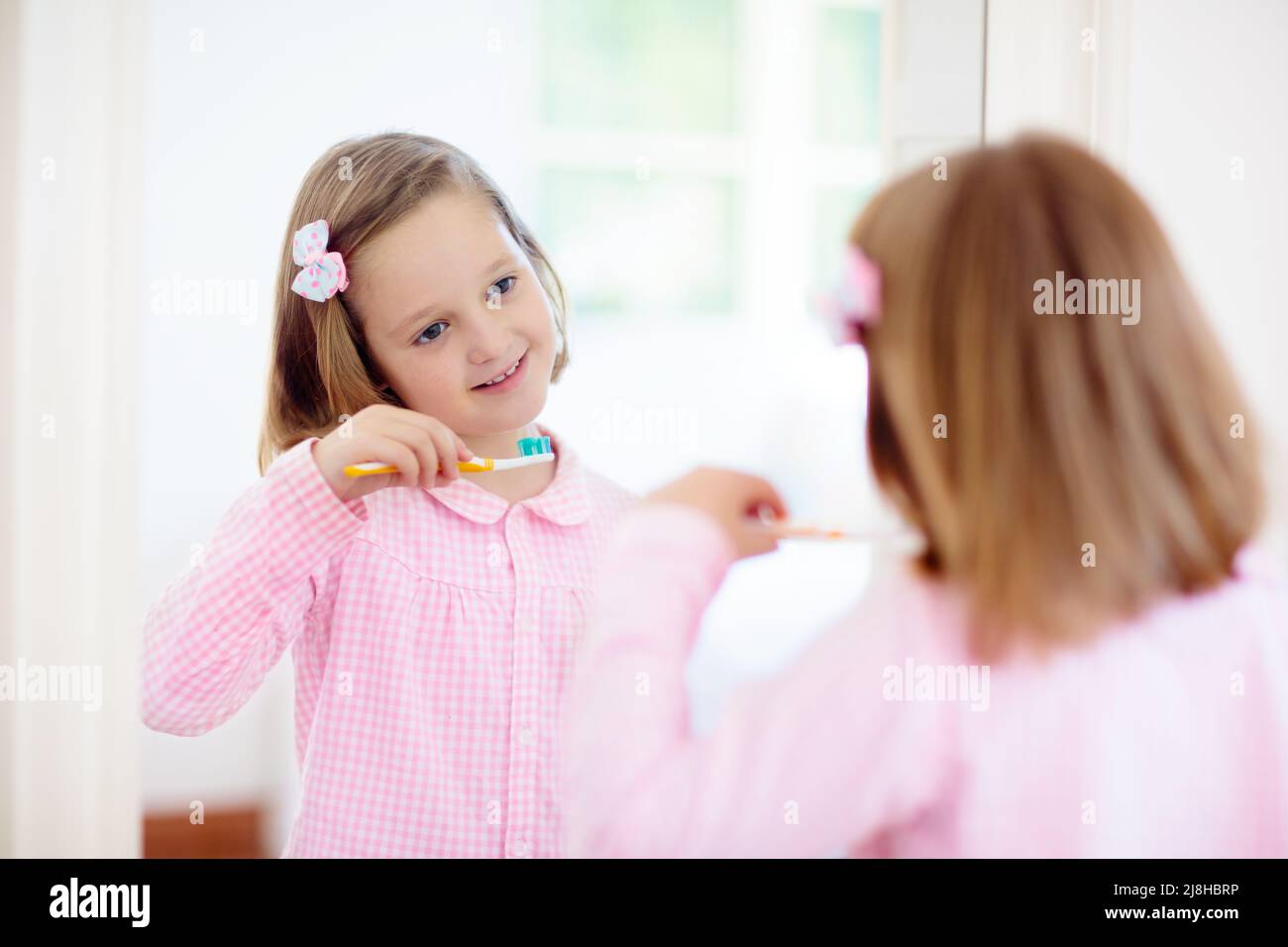 Child brushing teeth. Kids with toothpaste and brush. Dental and oral ...