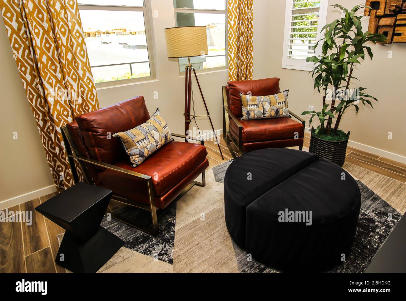 Two Upholstered Chairs And Ottoman In Home Den Stock Photo - Alamy