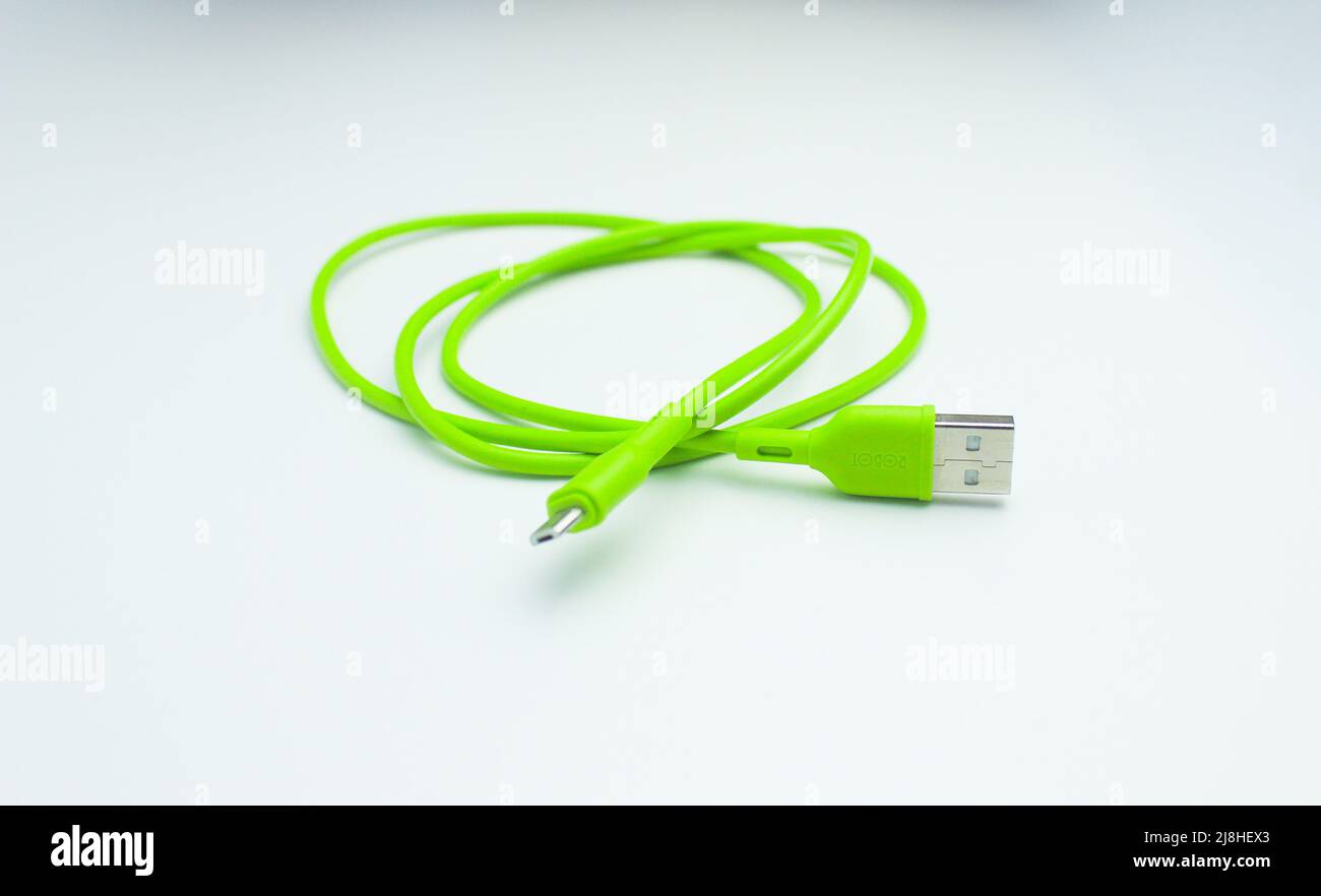 Green USB cable for smartphone isolated on white background Stock Photo ...