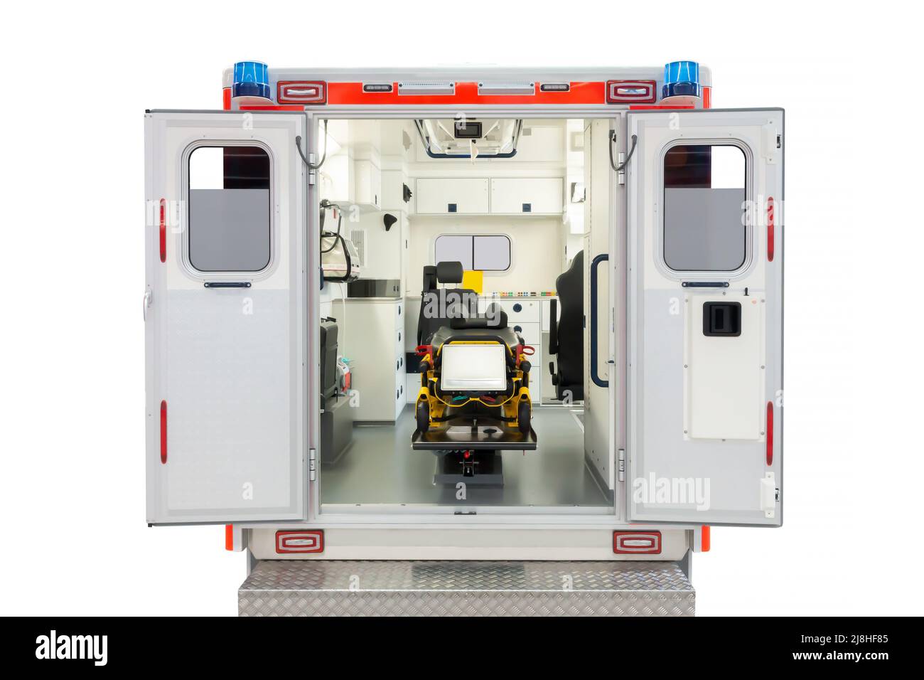 Rear view of the interior of an open ambulance isolated on a white ...