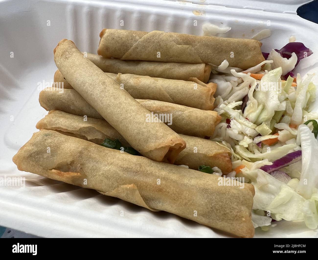 Take-out lumpia, or Filipino spring rolls, from a restaurant popup of ...