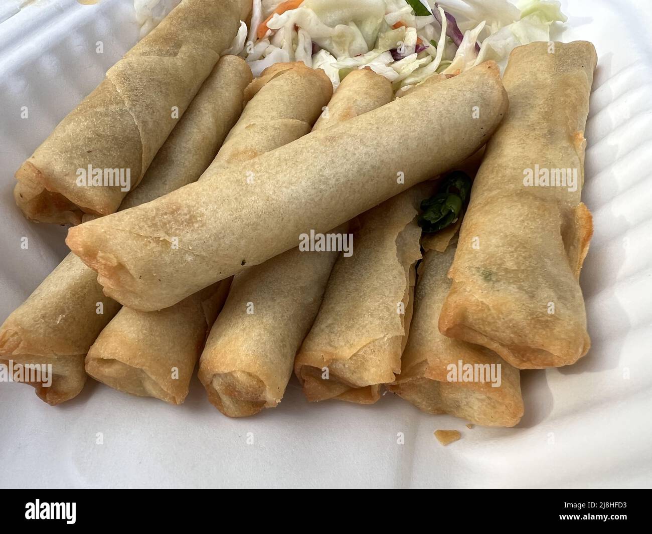 Take-out lumpia, or Filipino spring rolls, from a restaurant popup of ...
