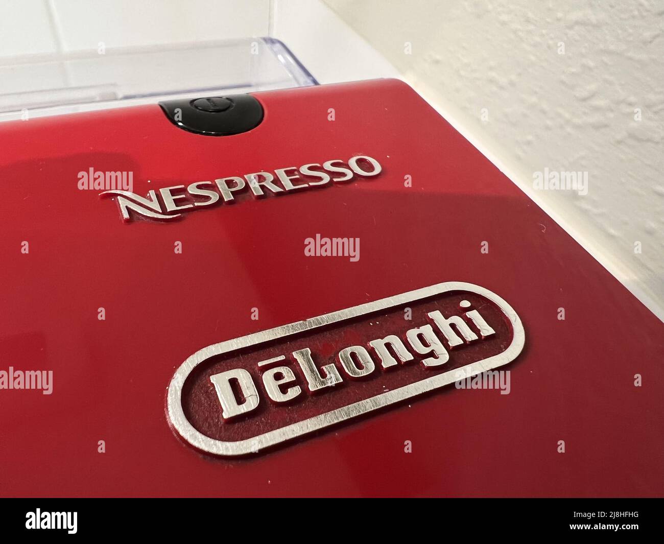 Red-colored Nespresso single-serving espresso maker from DeLonghi on ...