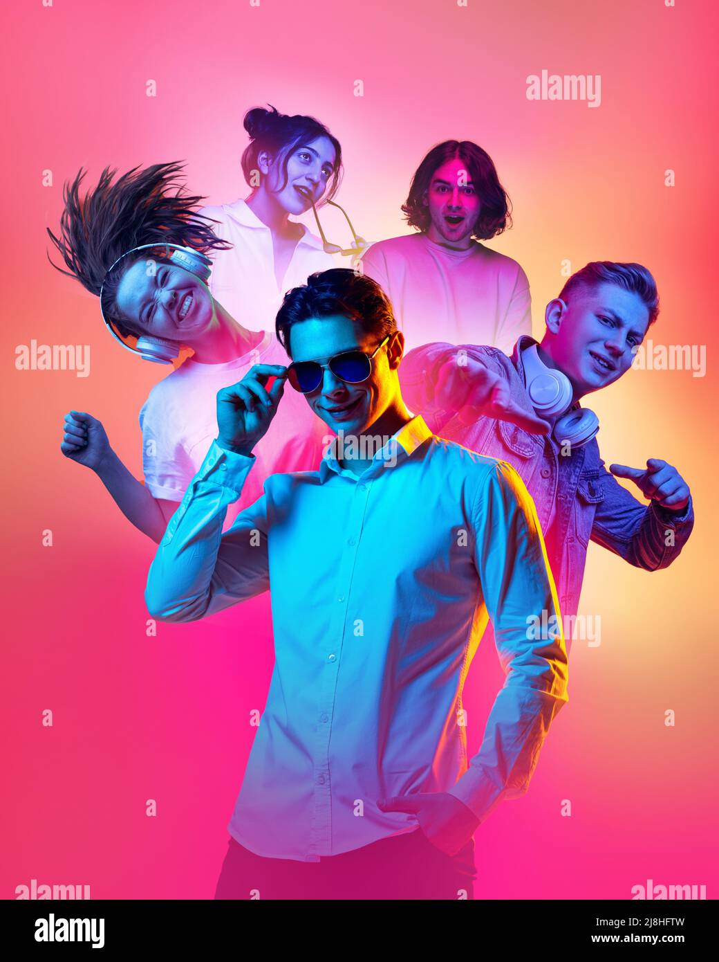 Poster with excited beautiful male and female models on pink color ...