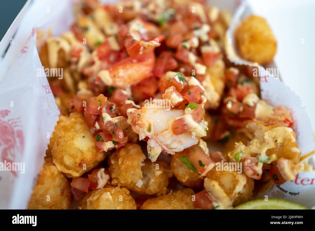 Lobster tots, featuring tater tots topped with lobster, from Cousins ...