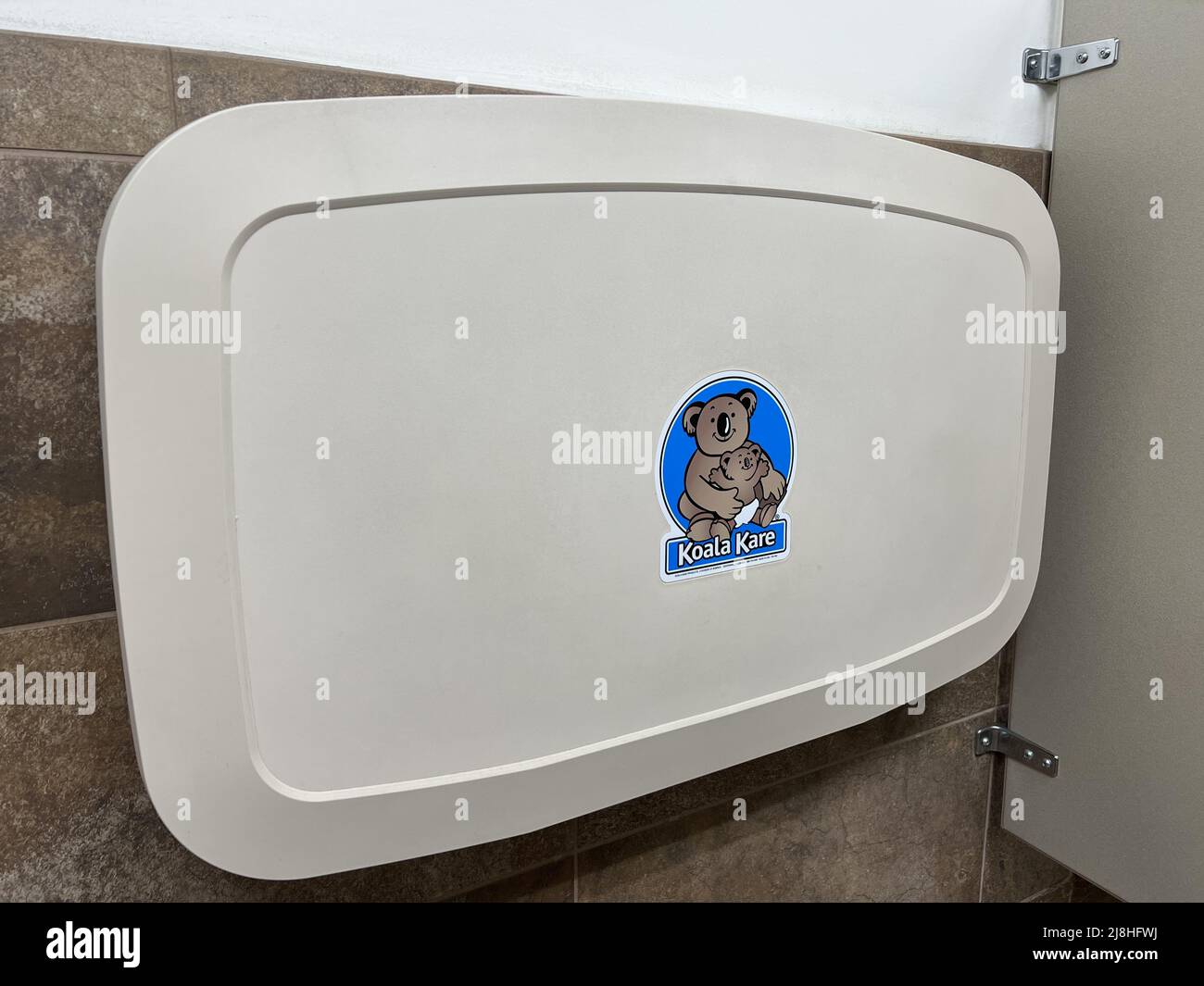 Koala Kare brand children's wall changing station in a retail store in ...