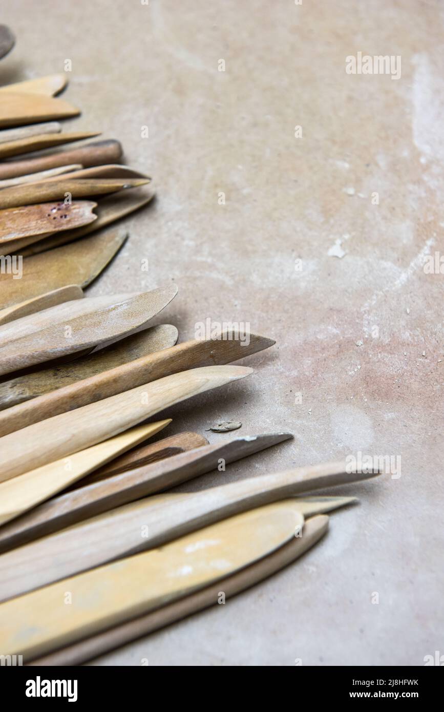 Wooden pottery tools set on a ceramics studio background Stock Photo ...