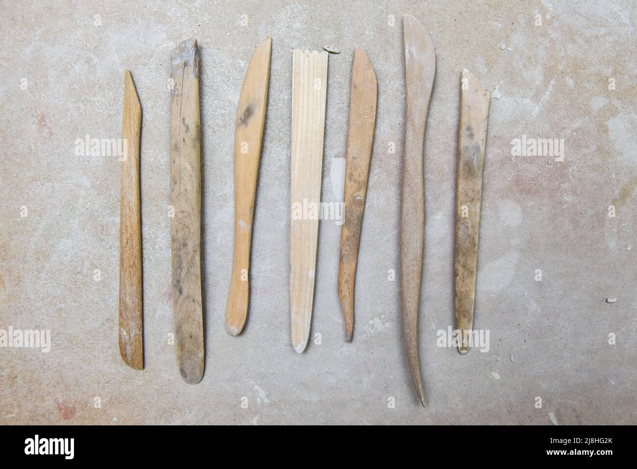 Wooden pottery tools set on a ceramics studio background Stock Photo ...