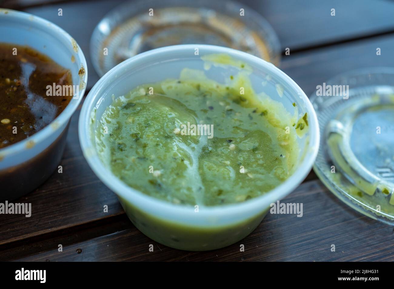 Container of Salsa Verde or green salsa at C Casa restaurant in San ...