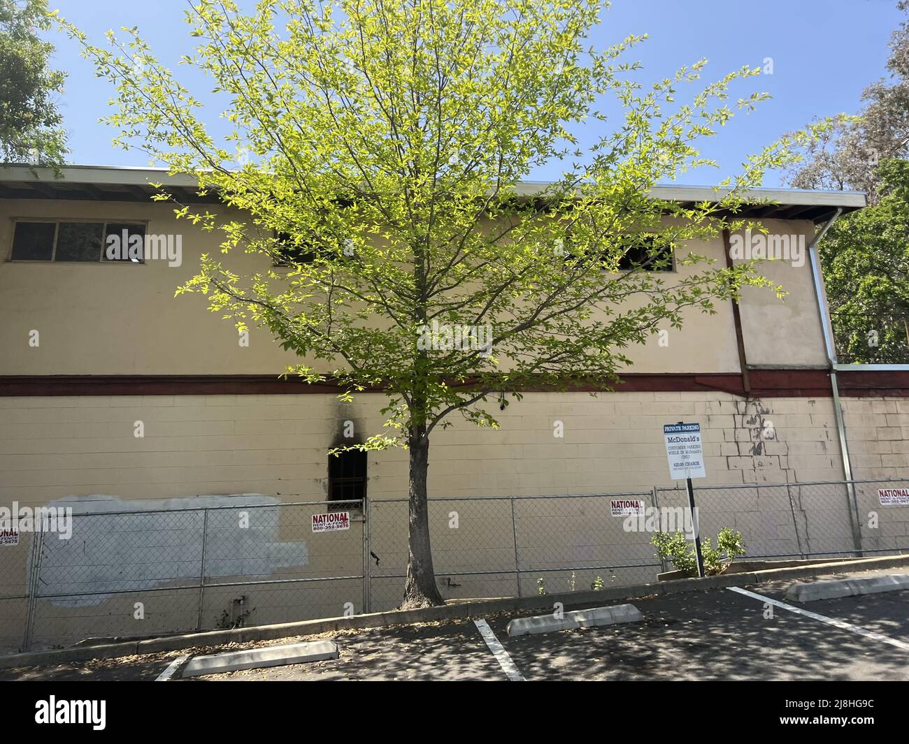 Scorch marks are visible on a building damaged in a fire in Lafayette ...